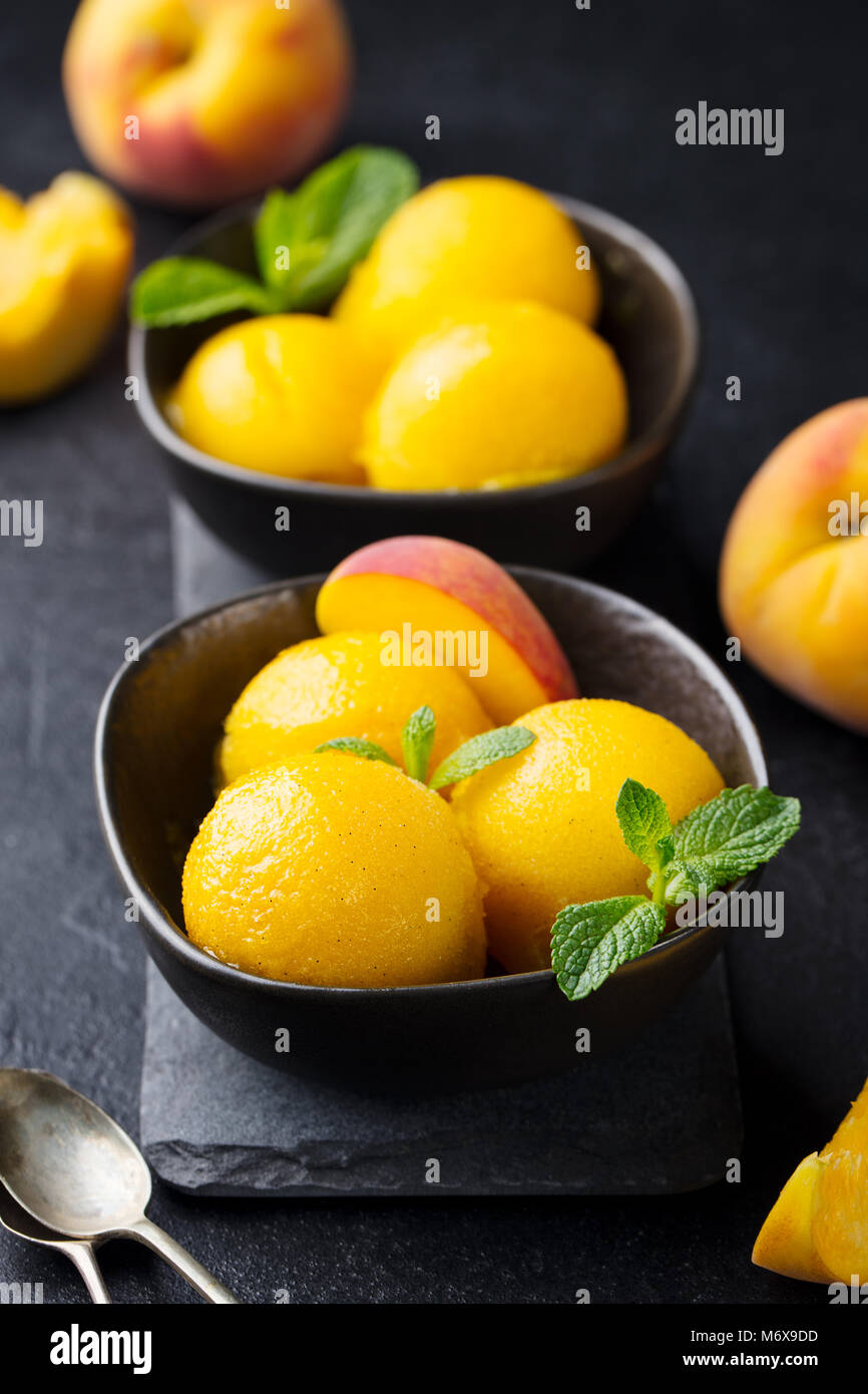 Mango, peach ice cream, tropical fruit sorbet Stock Photo - Alamy