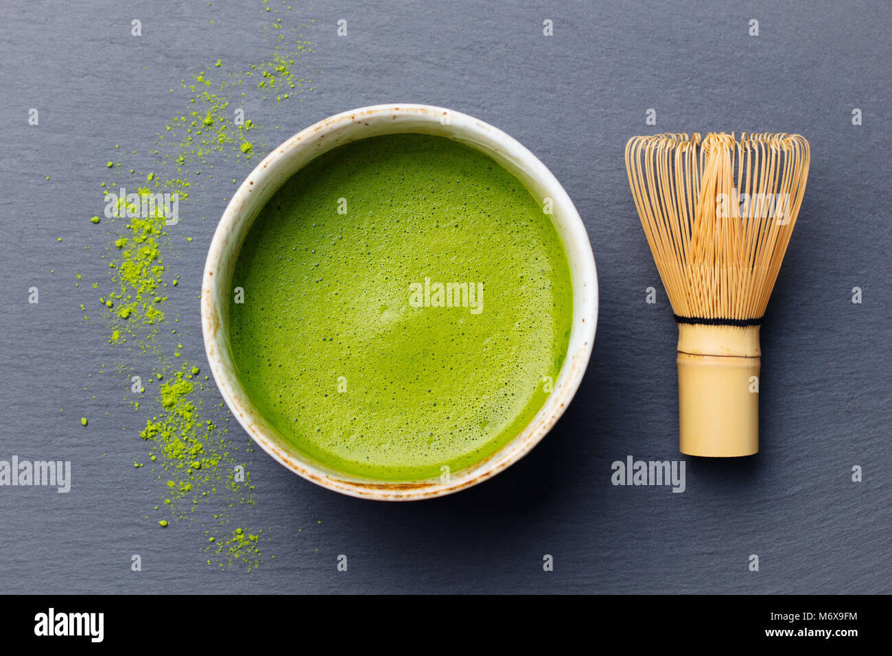 Matcha green tea cooking process in bowl Top view Stock Photo - Alamy