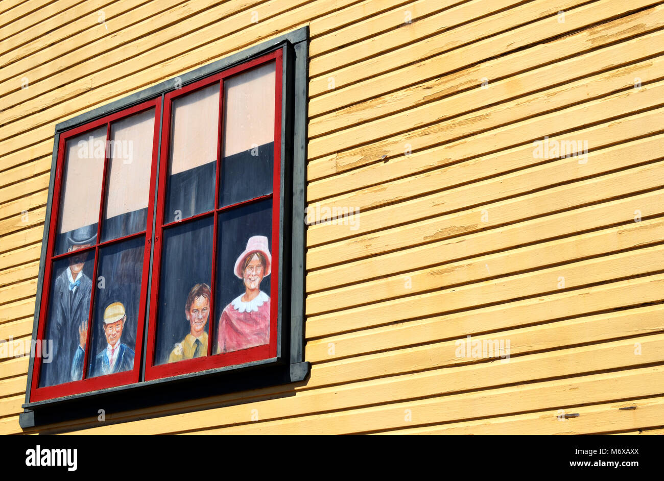 Window with painted people looking out taken at the Bega Cheese ...
