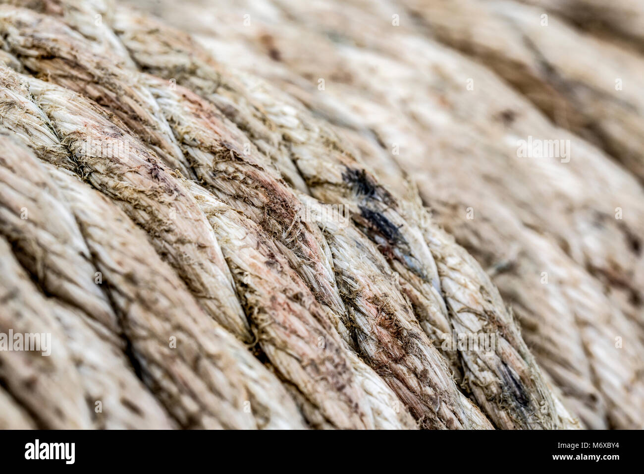 Rope wound around a winch close up Stock Photo - Alamy
