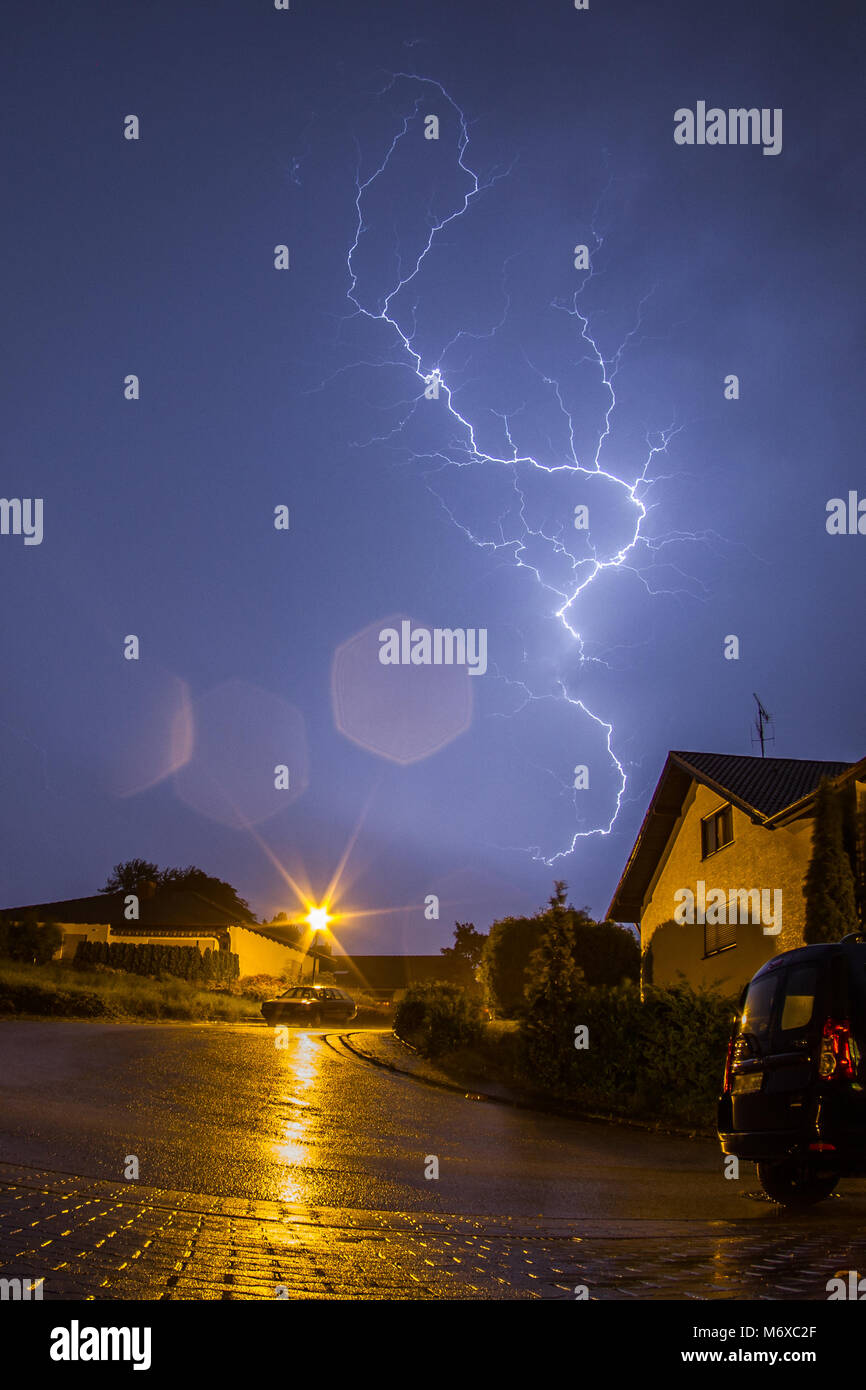 Thunderstorm lightning over houses hi-res stock photography and images ...