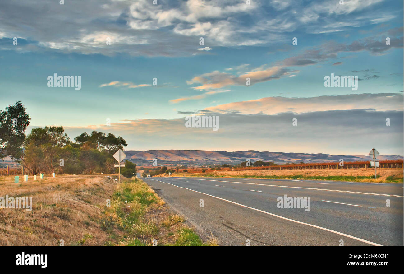 scenic country side road with beautiful landscape of vineyard and ...