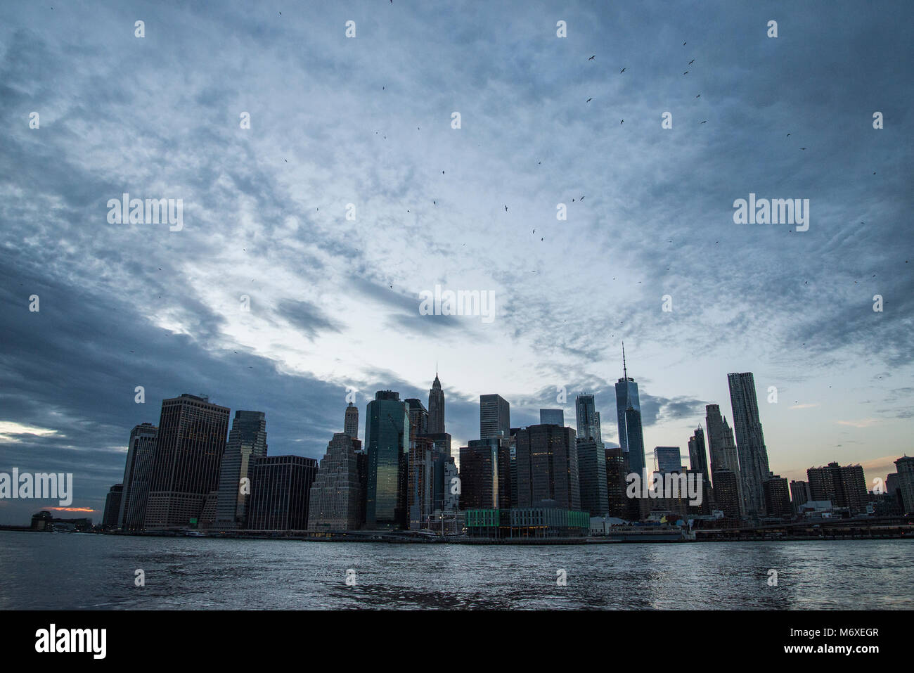 Manhattan skyline with the freedom tower after sunset Stock Photo - Alamy