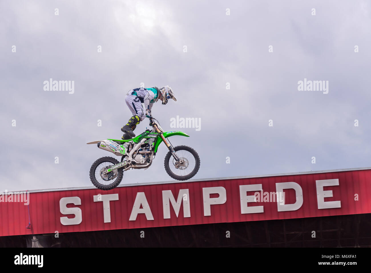 A member of the Global FMX professional freestyle motocross team begins ...