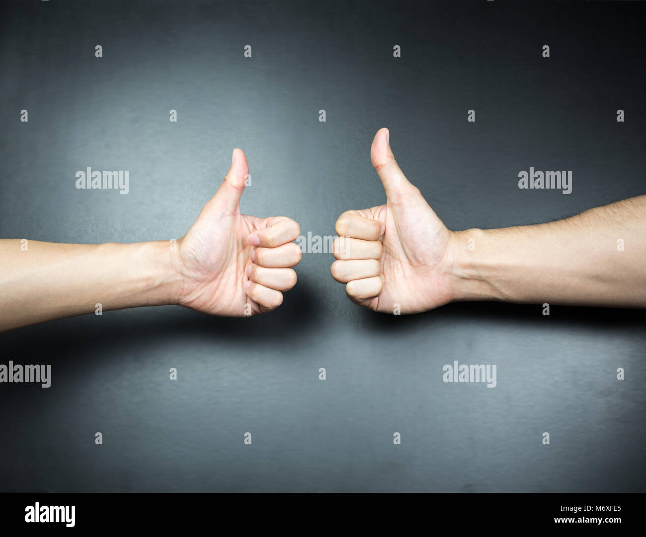 Thumbs Up hand gesture on background Stock Photo - Alamy