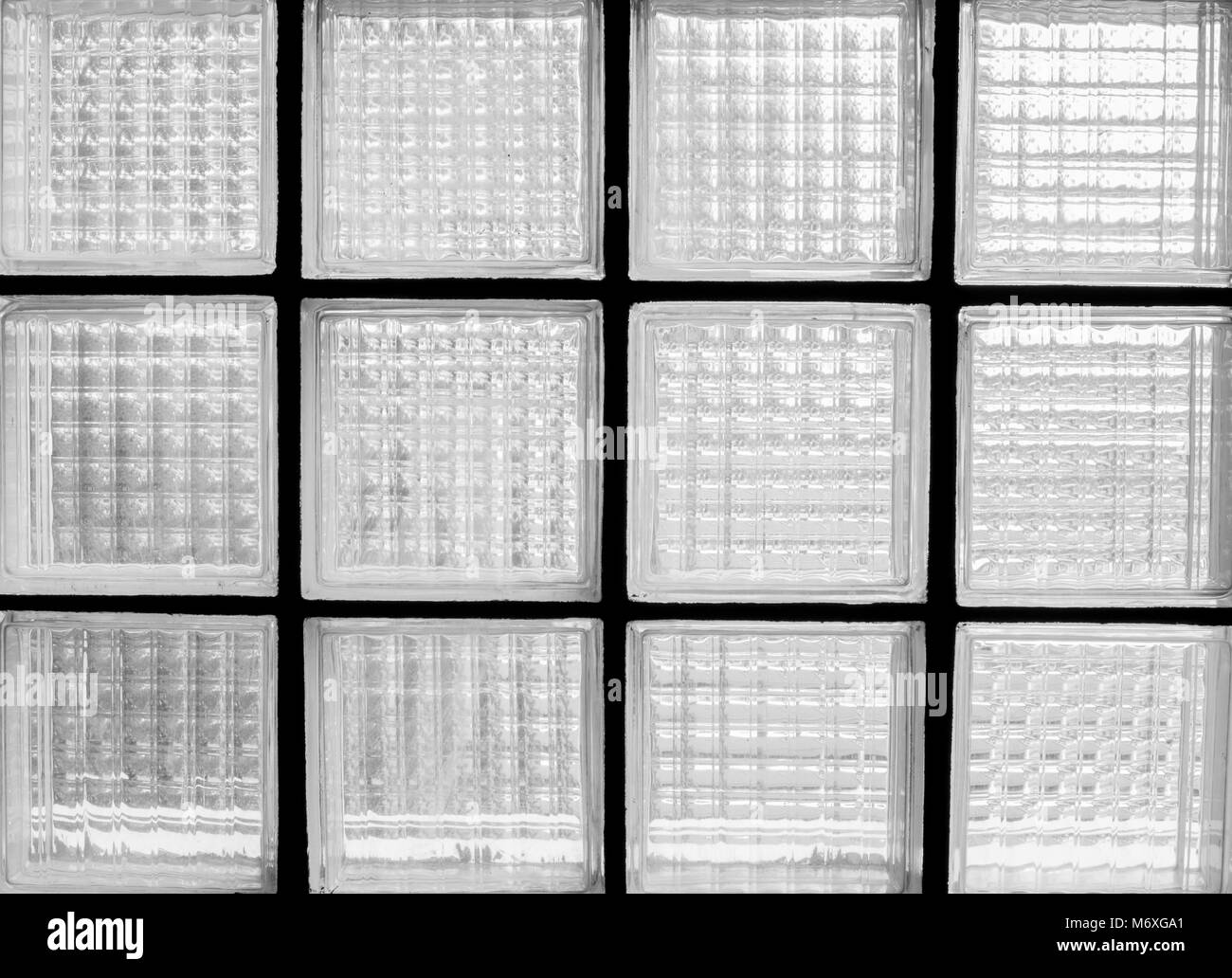 Square glass block on wall Stock Photo - Alamy