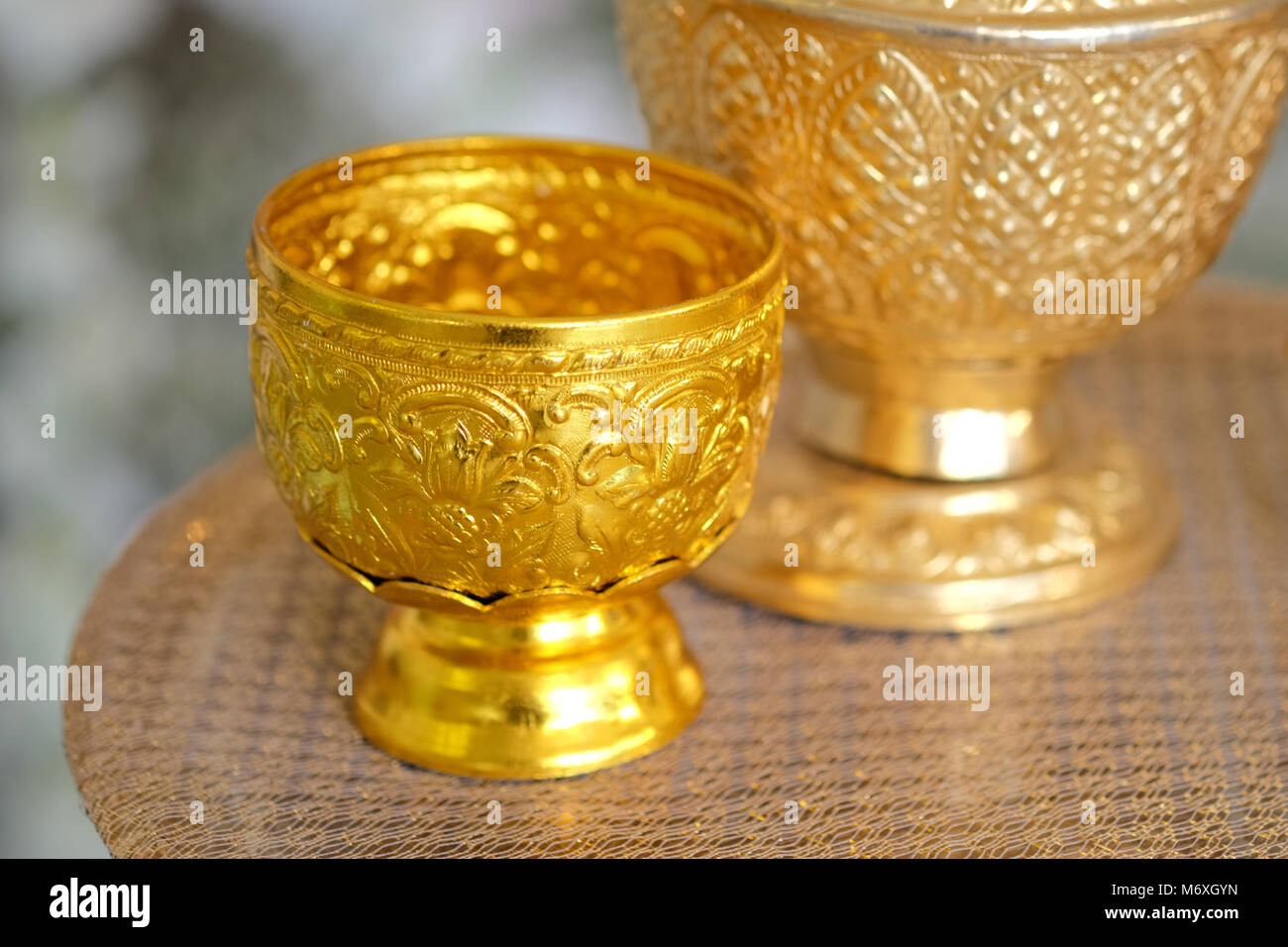 Old Thai style golden zinc bowl Stock Photo - Alamy