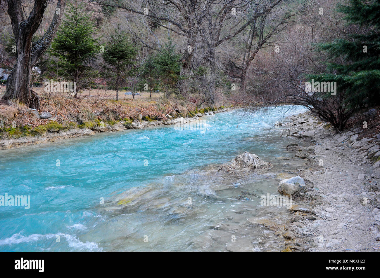Colorful turquoise river in Jiuzhaigou, China Stock Photo - Alamy