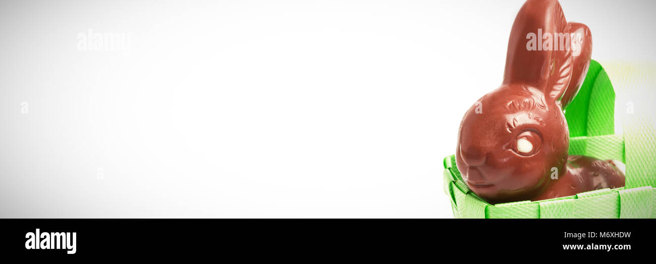 Chocolate bunny in a basket Stock Photo - Alamy