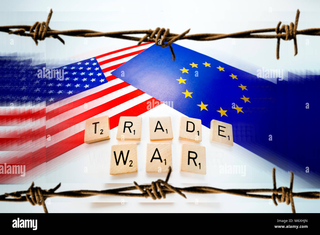 Letters forming the words trade and war in front of the flags of the ...