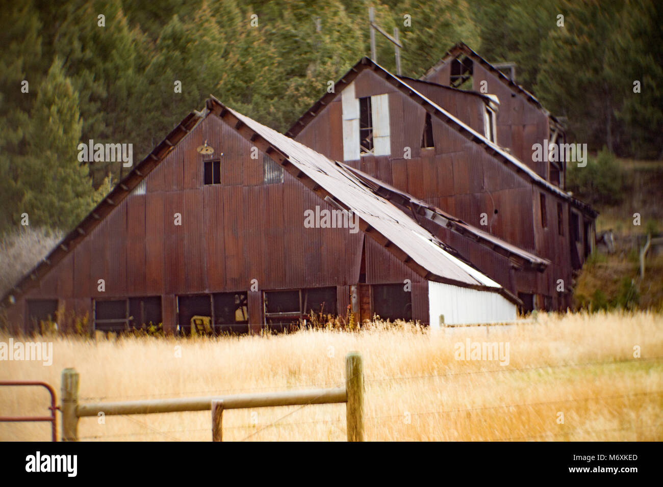 A rusty, corrugated steel building near the Henderson Creek Mine, on ...