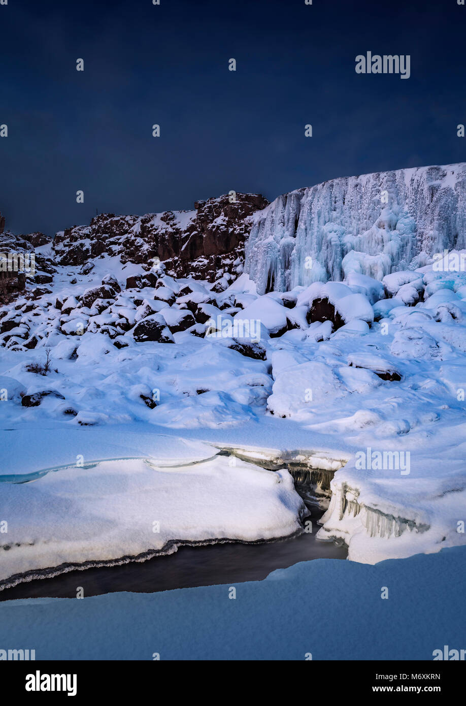 Frozen Oxararfoss Waterfall, Thingvellir National Park, Iceland. Unesco ...