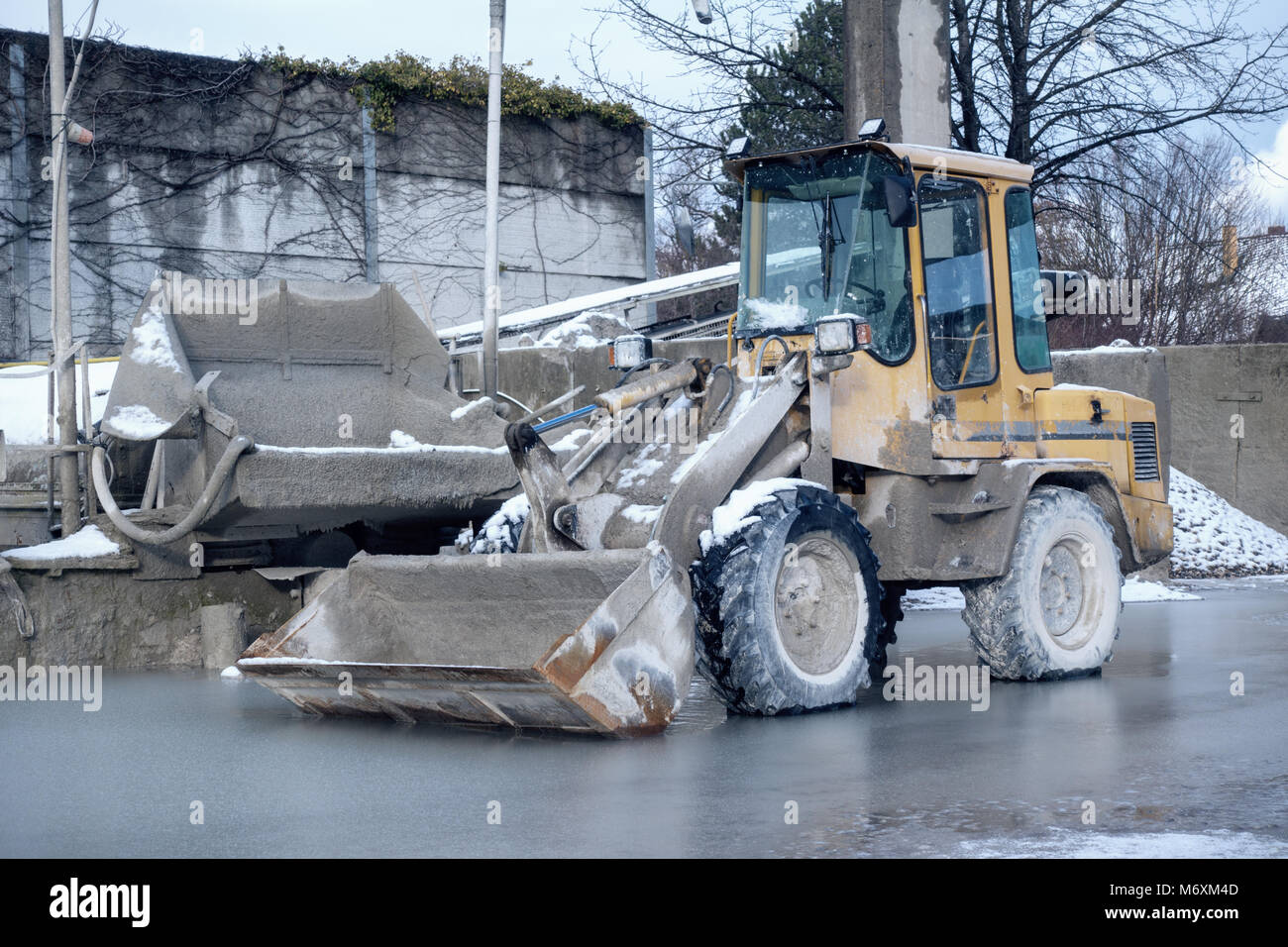 a digger in freezing cold Stock Photo - Alamy