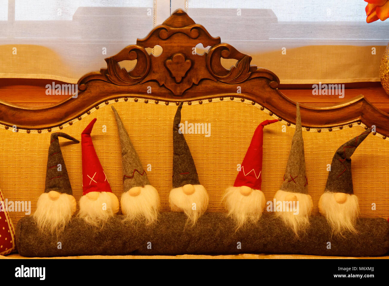 Group of Christmas soft toy elves A small cute Xmas gnomes sits on a ...