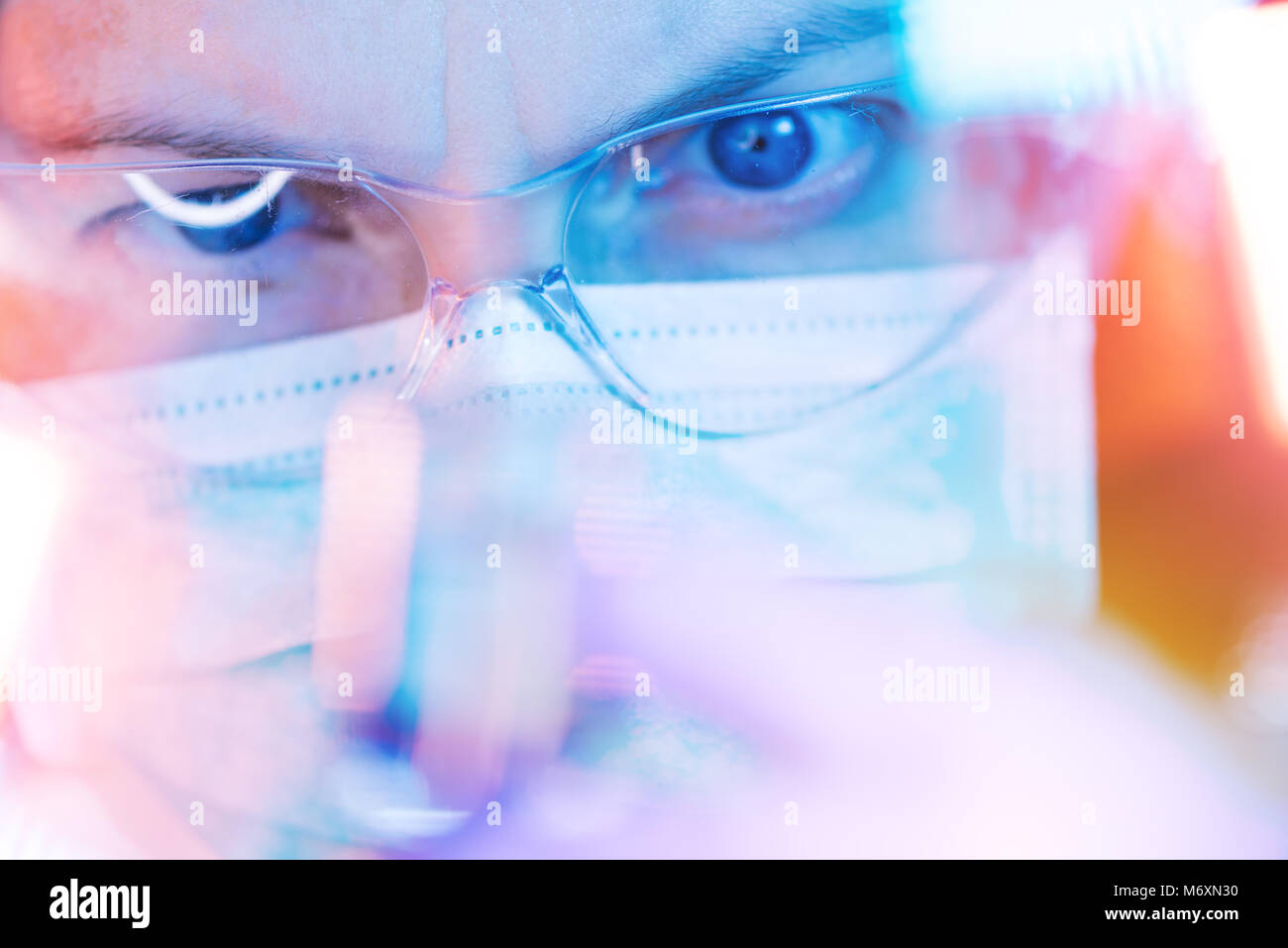 Medical science researcher performing scientific test in laboratory ...