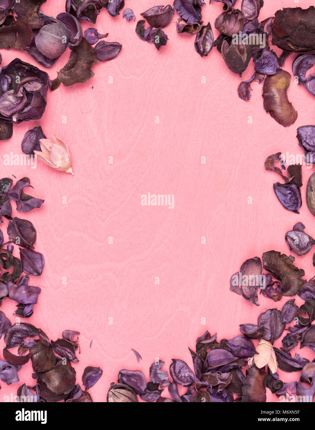 pink wooden background with small natural elements Stock Photo - Alamy