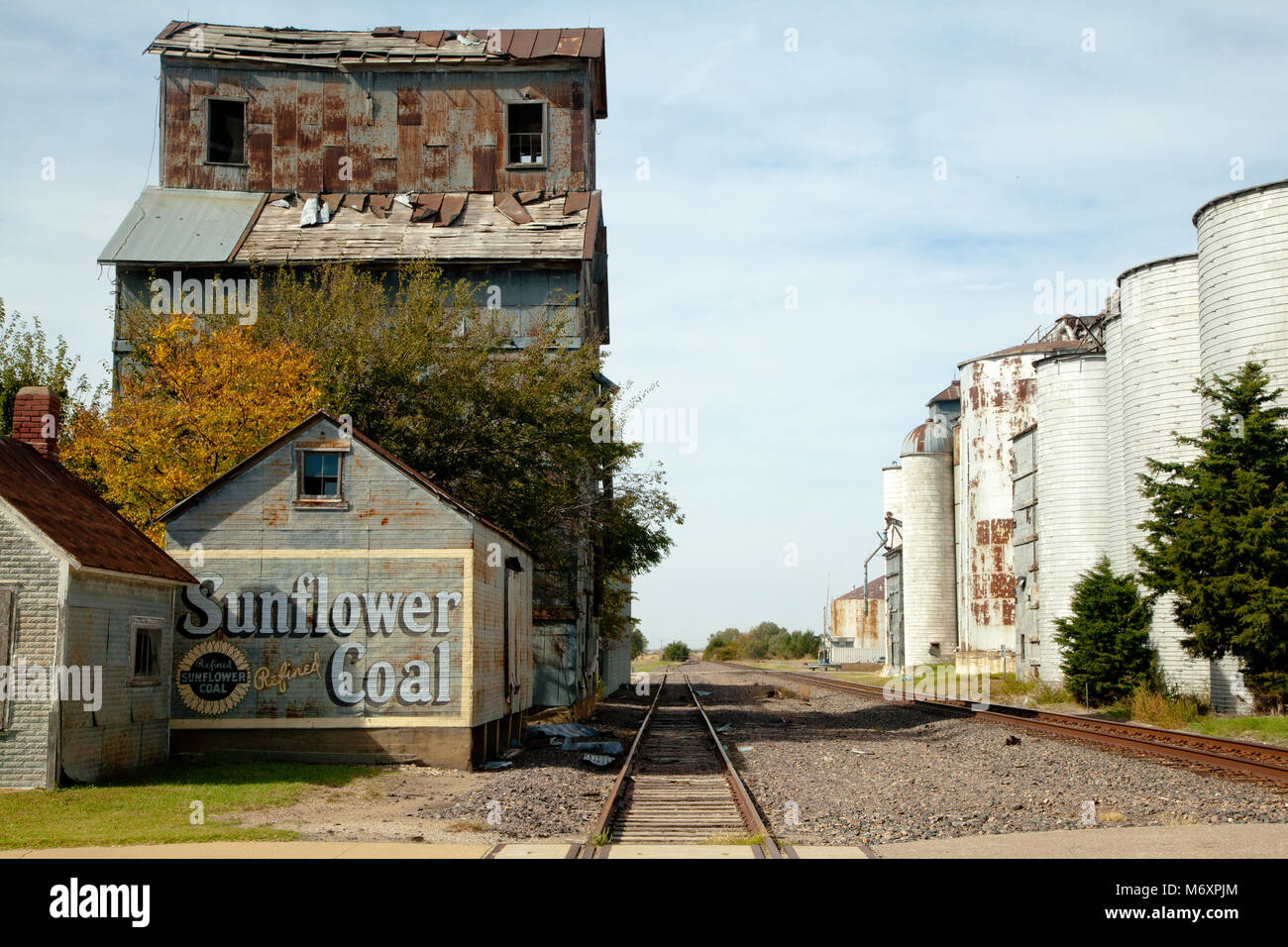 Old railroad warehouse and grain elevators in Kansas, 2017 Stock Photo ...