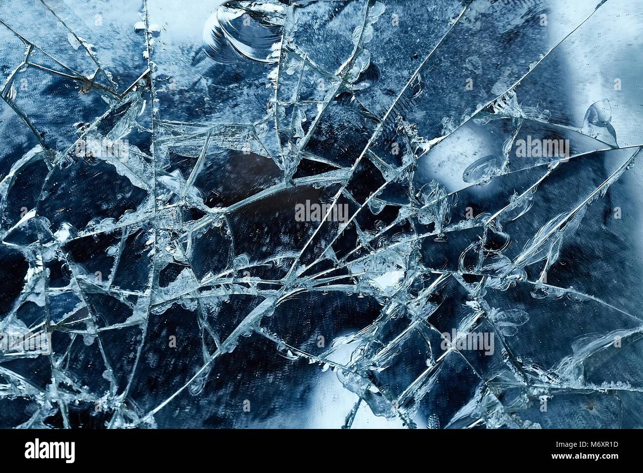 Cracked glass detail Stock Photo - Alamy