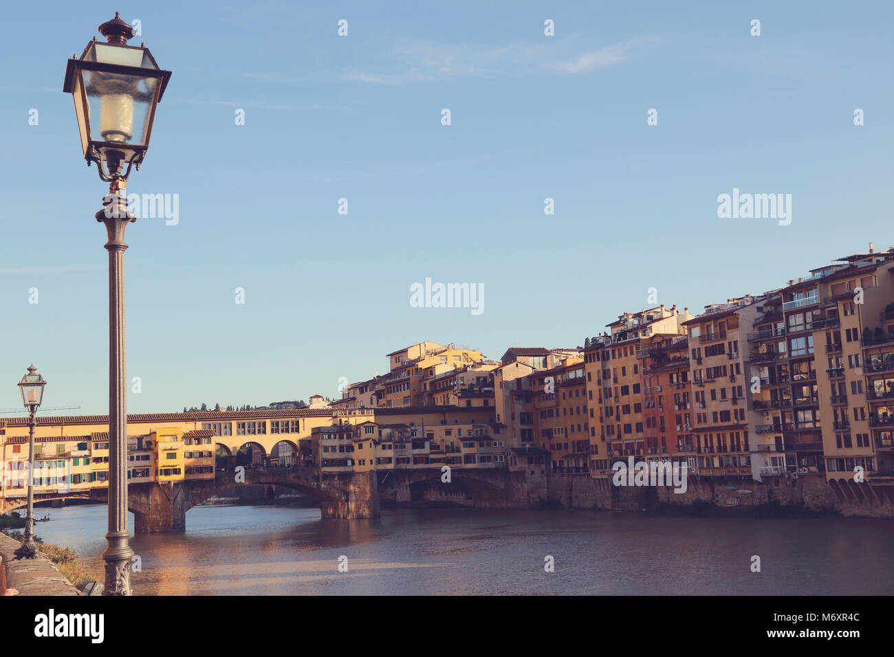 Florence streets near landmark bridge Ponte Vecchio Stock Photo - Alamy