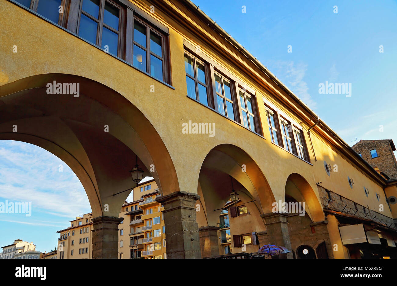 Florence streets near landmark bridge Ponte Vecchio Stock Photo - Alamy