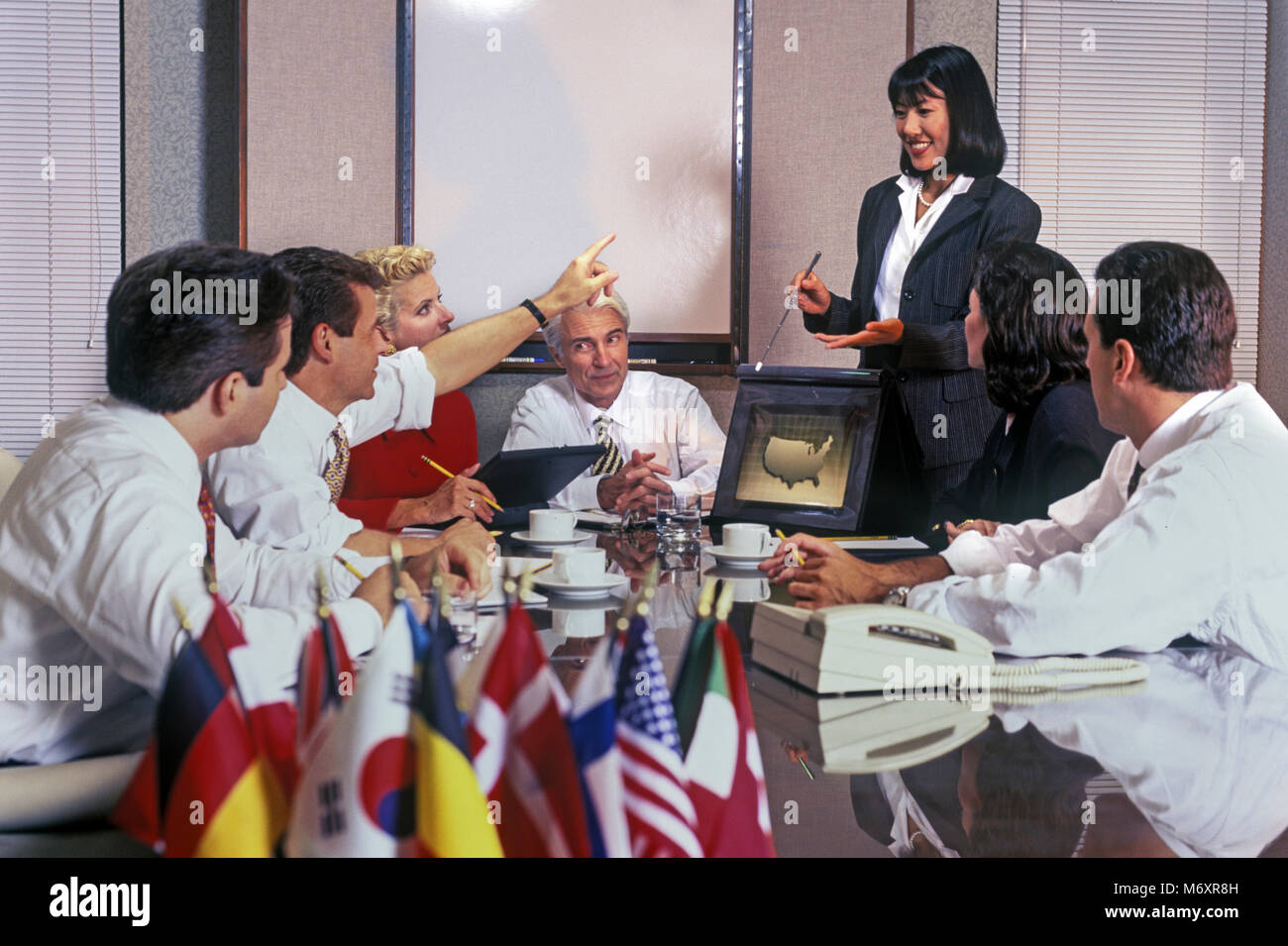 2000 HISTORICAL ASIAN BUSINESS WOMAN MAKES PRESENTATION TO GROUP OF ...