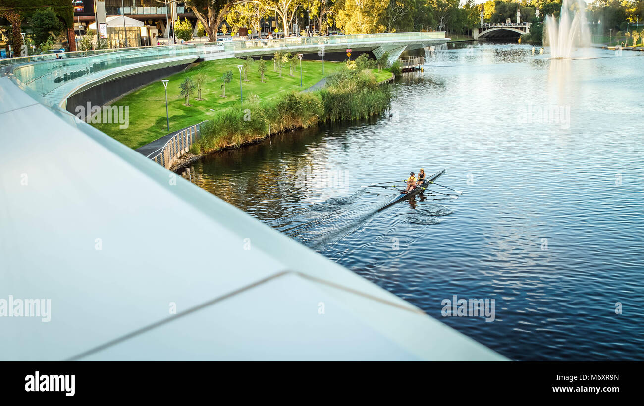 paddling a canoe under the bridge Stock Photo - Alamy