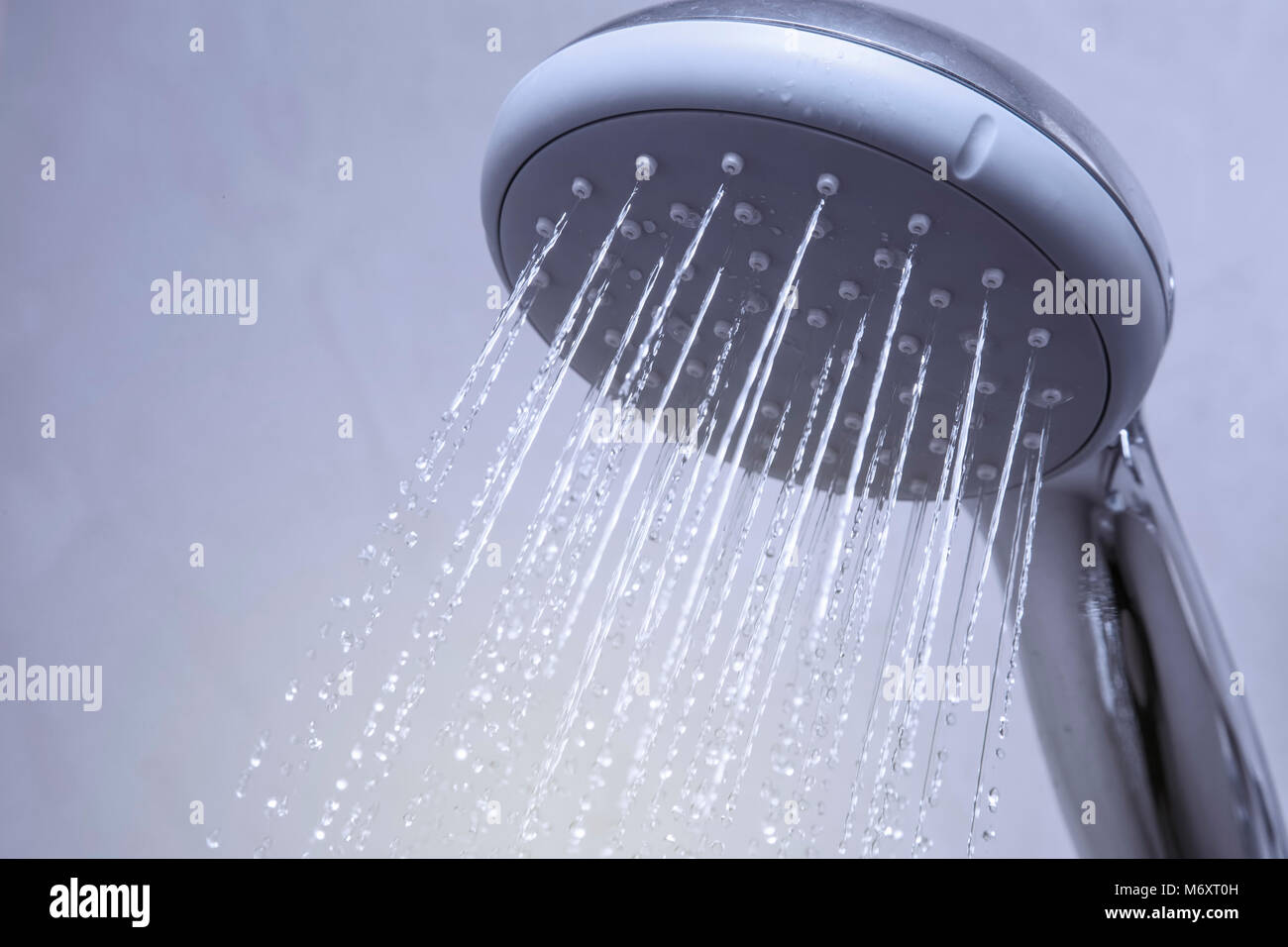 Shower head in bathroom with water drops Stock Photo - Alamy