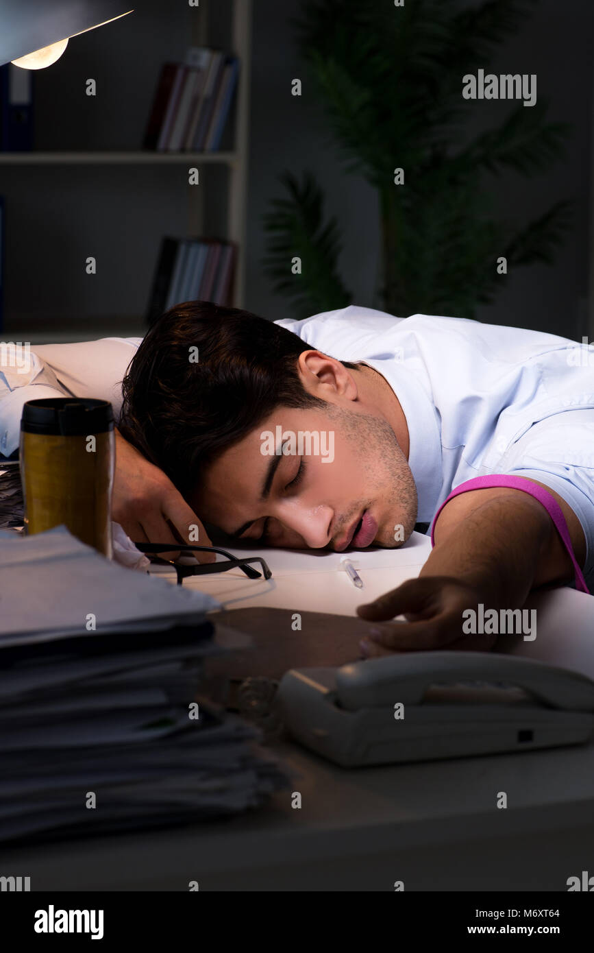 Employee relieving stress from overtime with drugs narcotics Stock ...