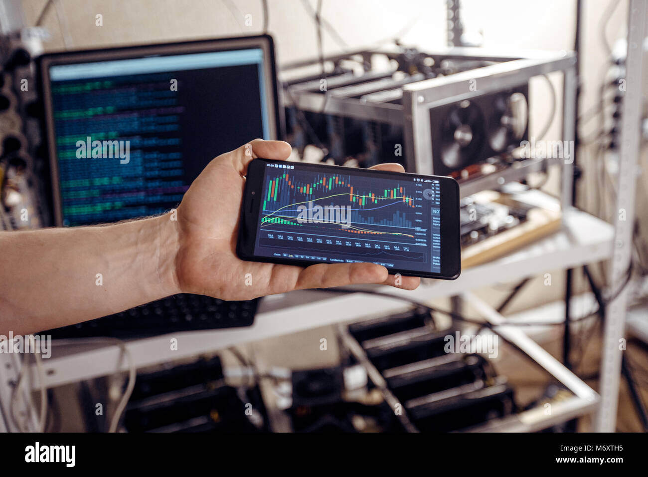 Dynamics of development on the phone display Stock Photo - Alamy