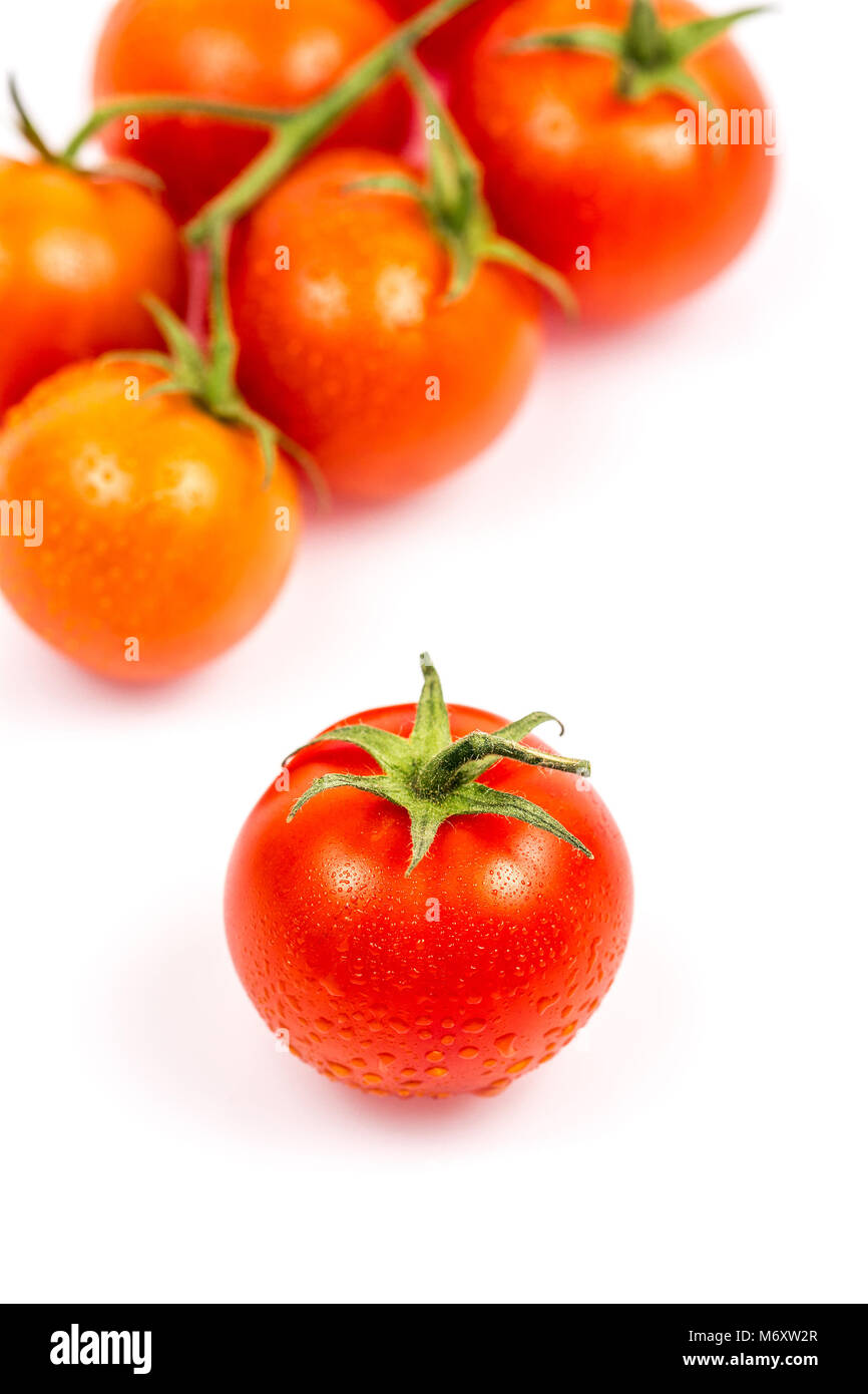 Tomato with water drops isolated on white background Stock Photo - Alamy