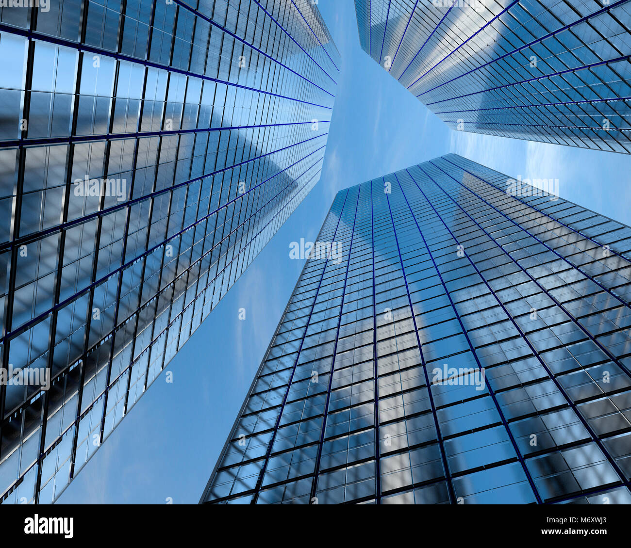 Three skyscraper on a background of sky and clouds Stock Photo - Alamy