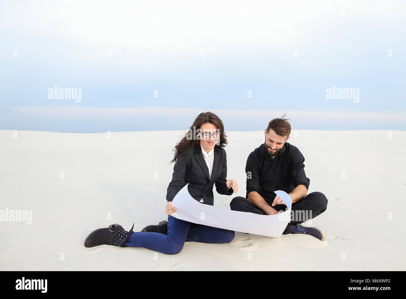 Economists brother and sister planning shopping center in dese Stock ...