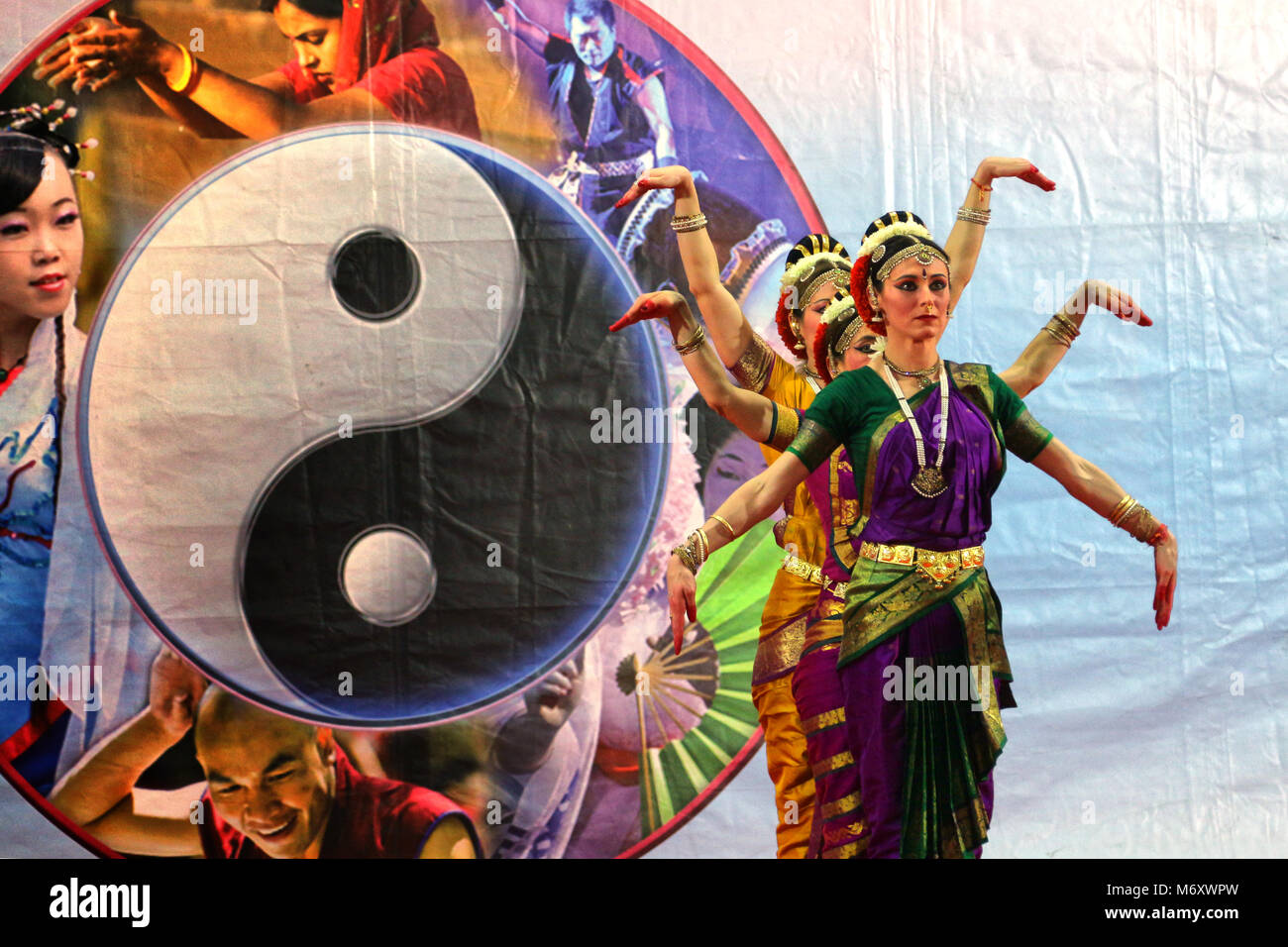 India traditional dance with yin yang symbol Stock Photo - Alamy