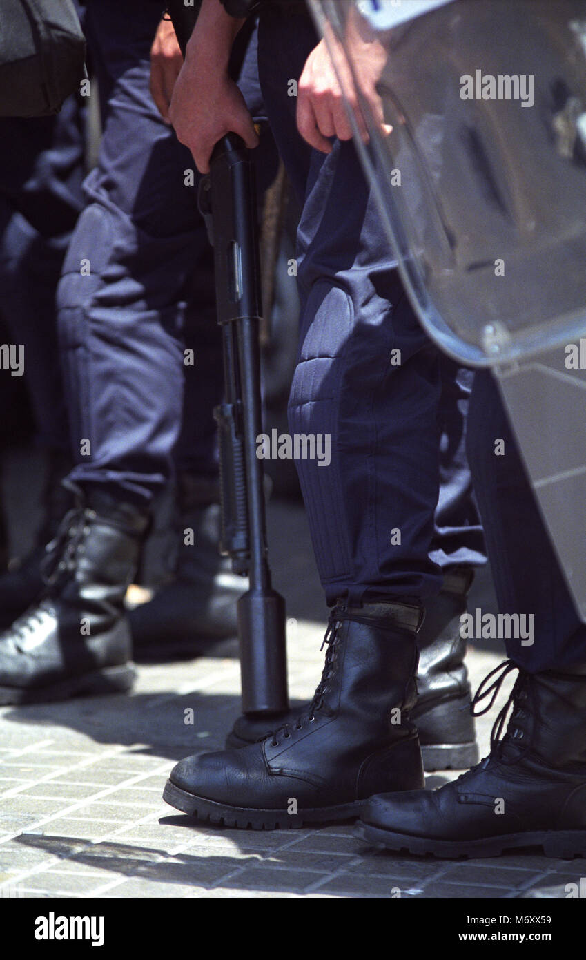 Police in boots hi-res stock photography and images - Alamy