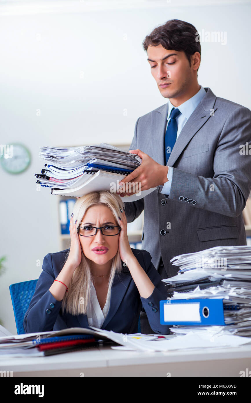 Angry irate boss yelling and shouting at his secretary employee Stock ...