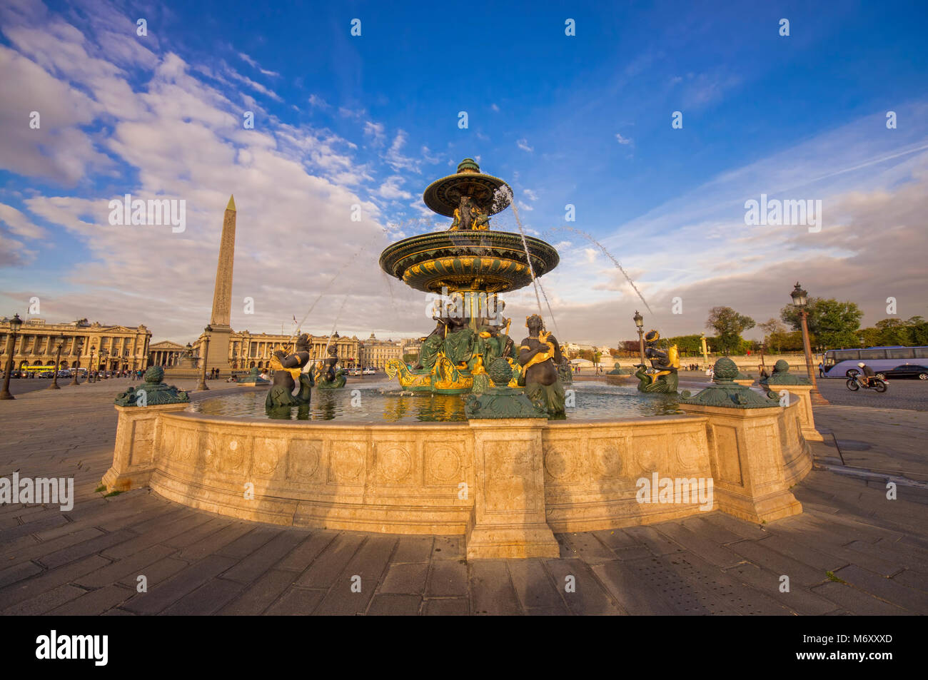 A fountain and the Obelisk on Concorde square (Place de la Concorde) in ...