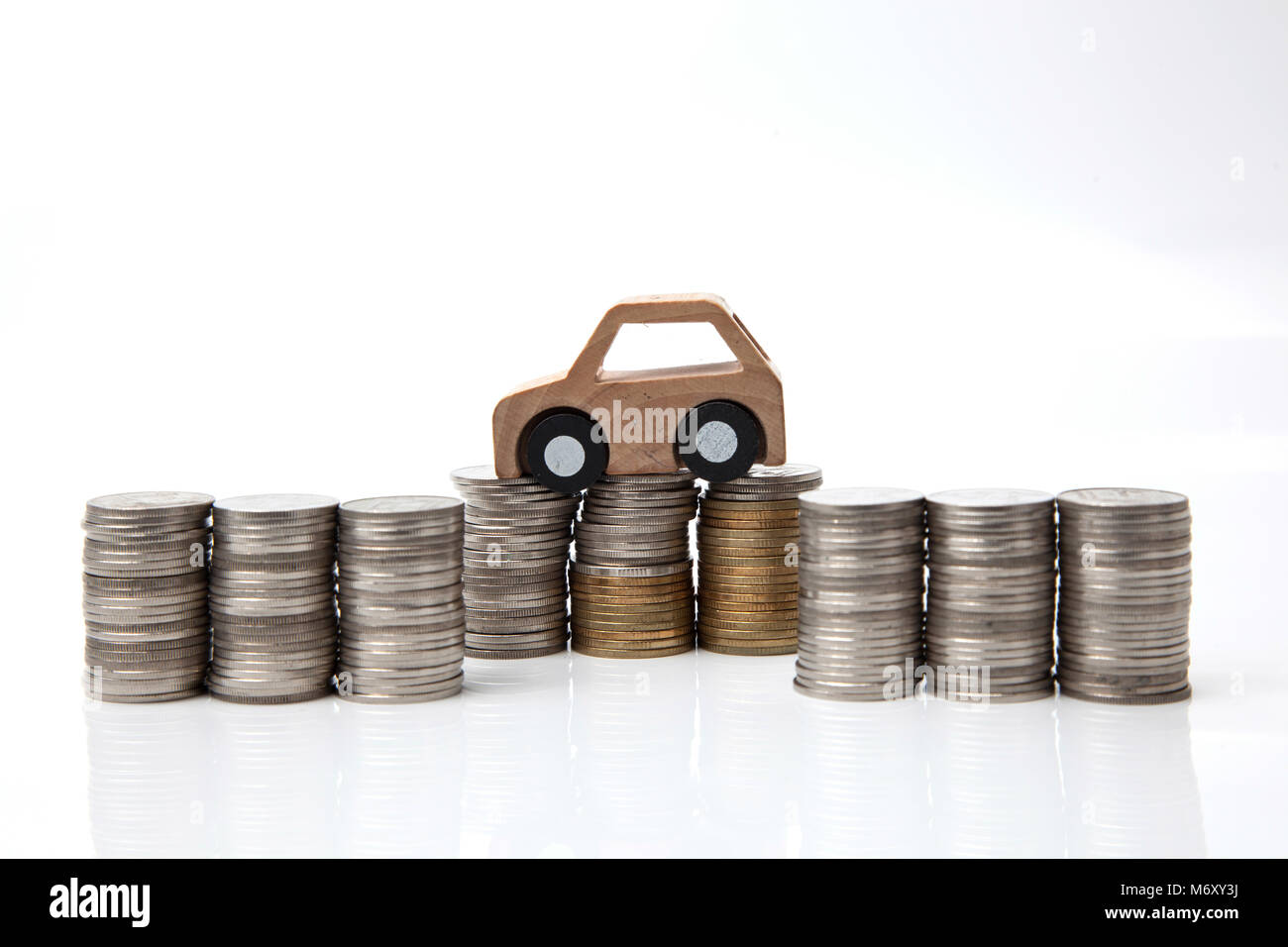 Driving on coins hi-res stock photography and images - Alamy
