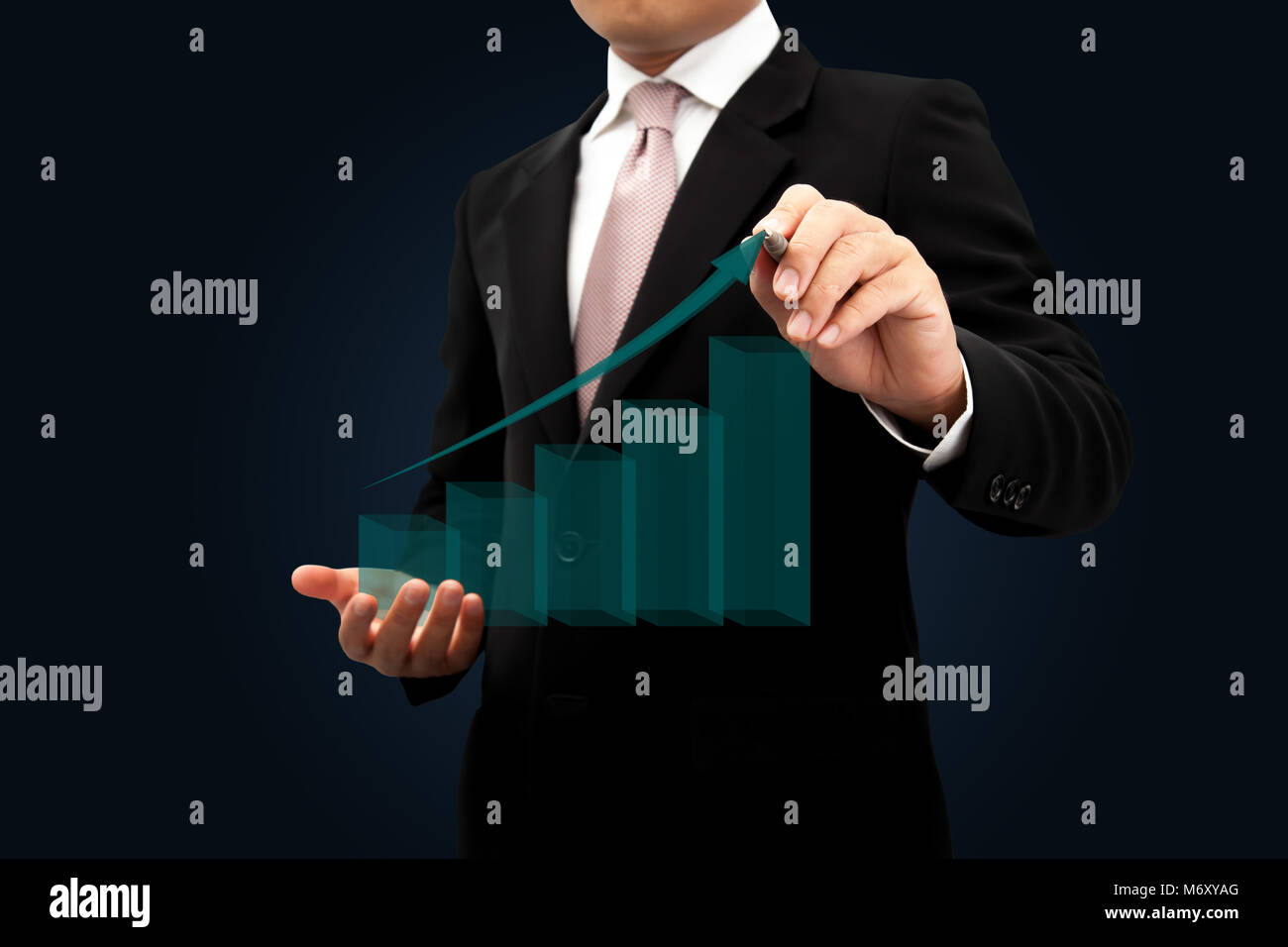 Businessman with growth chart of profits Stock Photo - Alamy