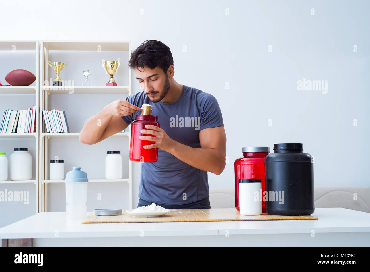 Athlete tasting new protein supplements for better muscles Stock Photo ...