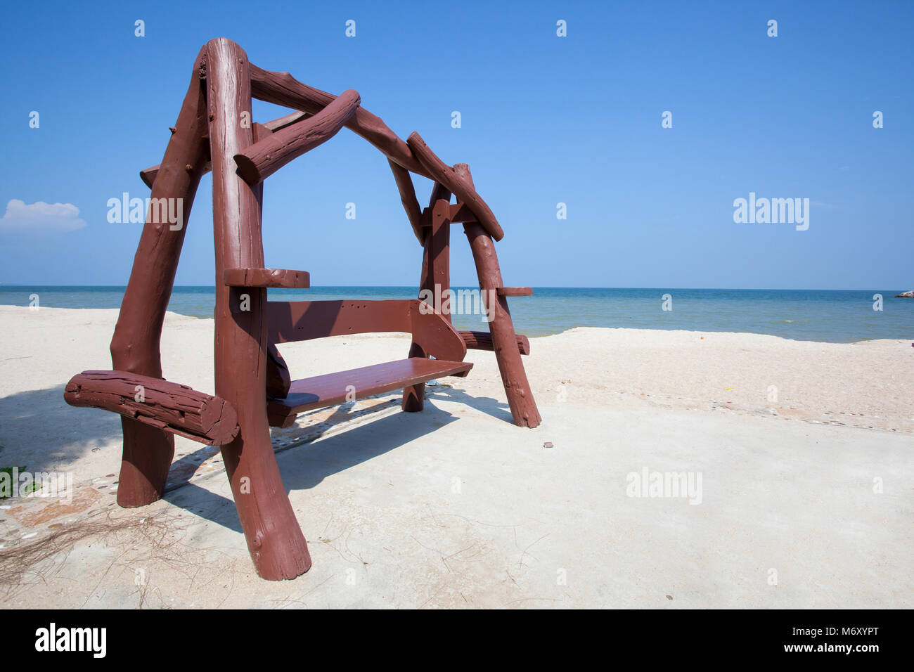 Wooden benches on beach Stock Photo - Alamy