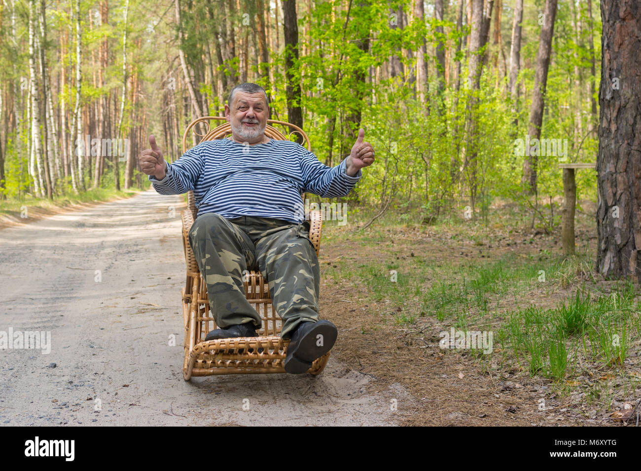 Old man rocking chair hi-res stock photography and images - Alamy
