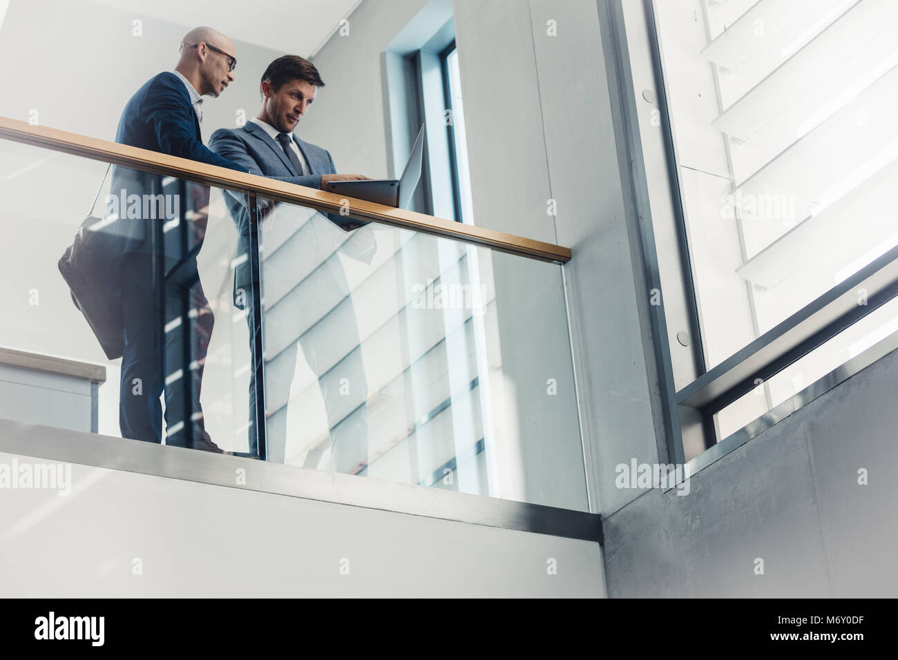 Business men standing low angle hi-res stock photography and images - Alamy