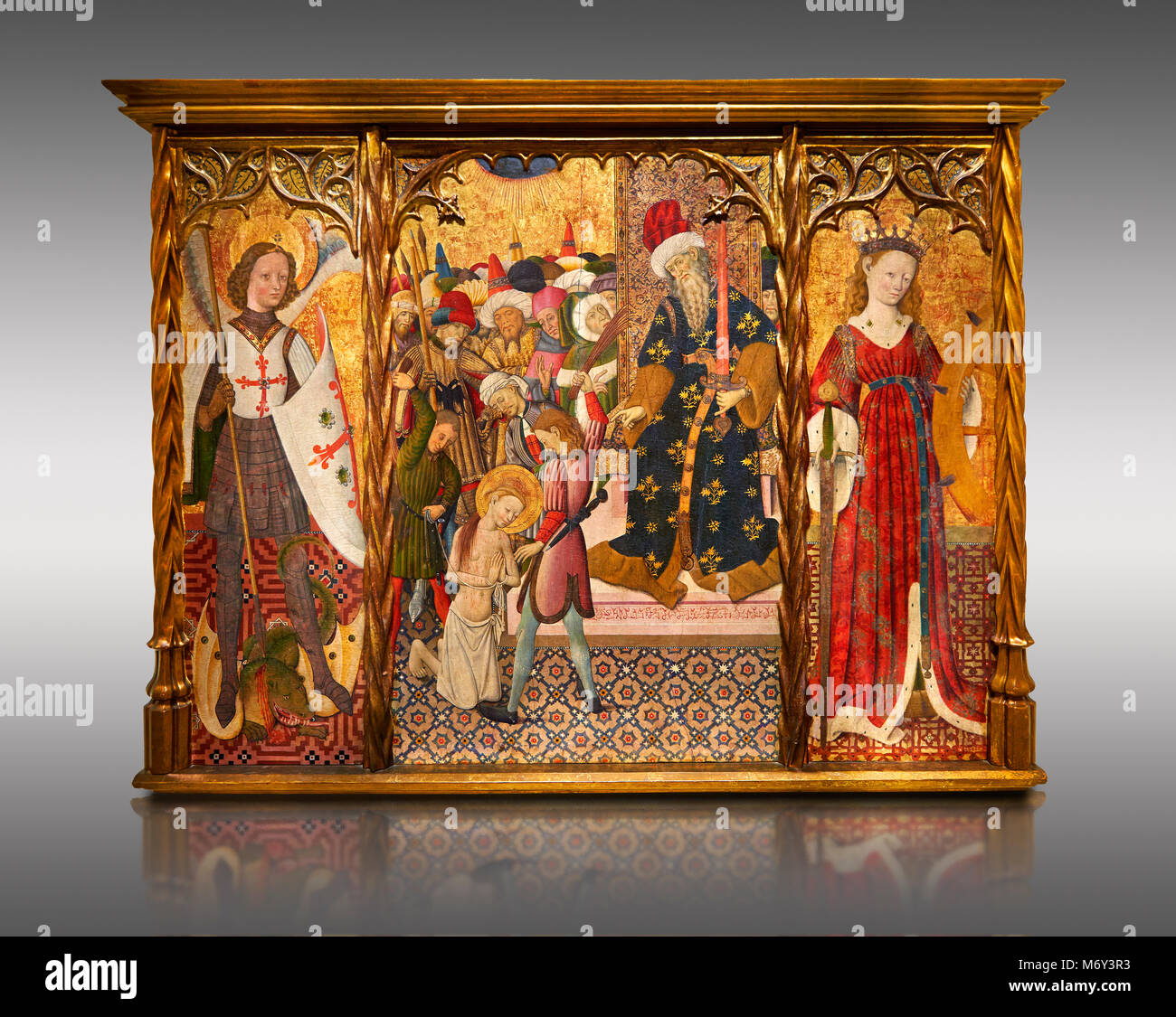 Gothic altarpiece depicting left to right - the Archangel Gabriel, the ...