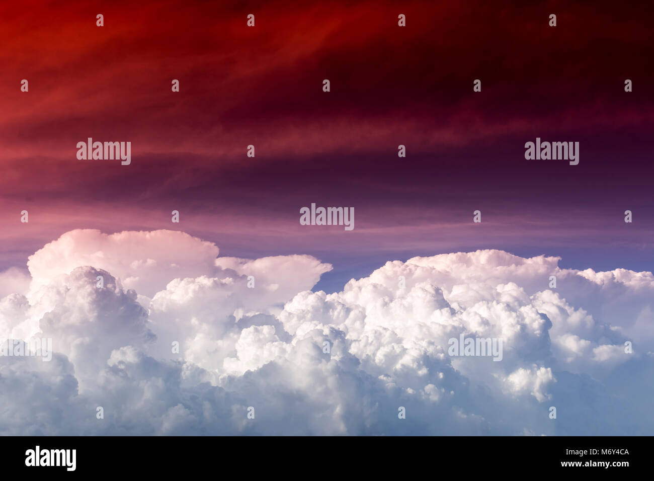 Two types of sky, Red sky on tundestorm clouds Stock Photo - Alamy