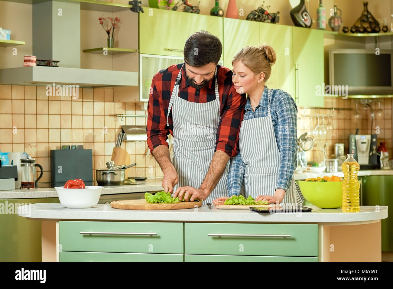 Couple preparing fresh meal hi-res stock photography and images - Alamy