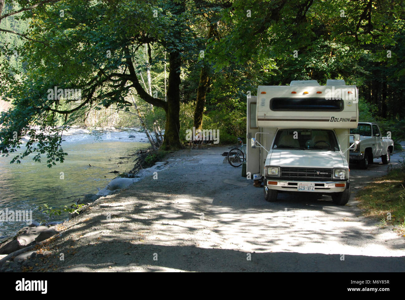 camping river motorhome rv people altair campground Stock Photo - Alamy