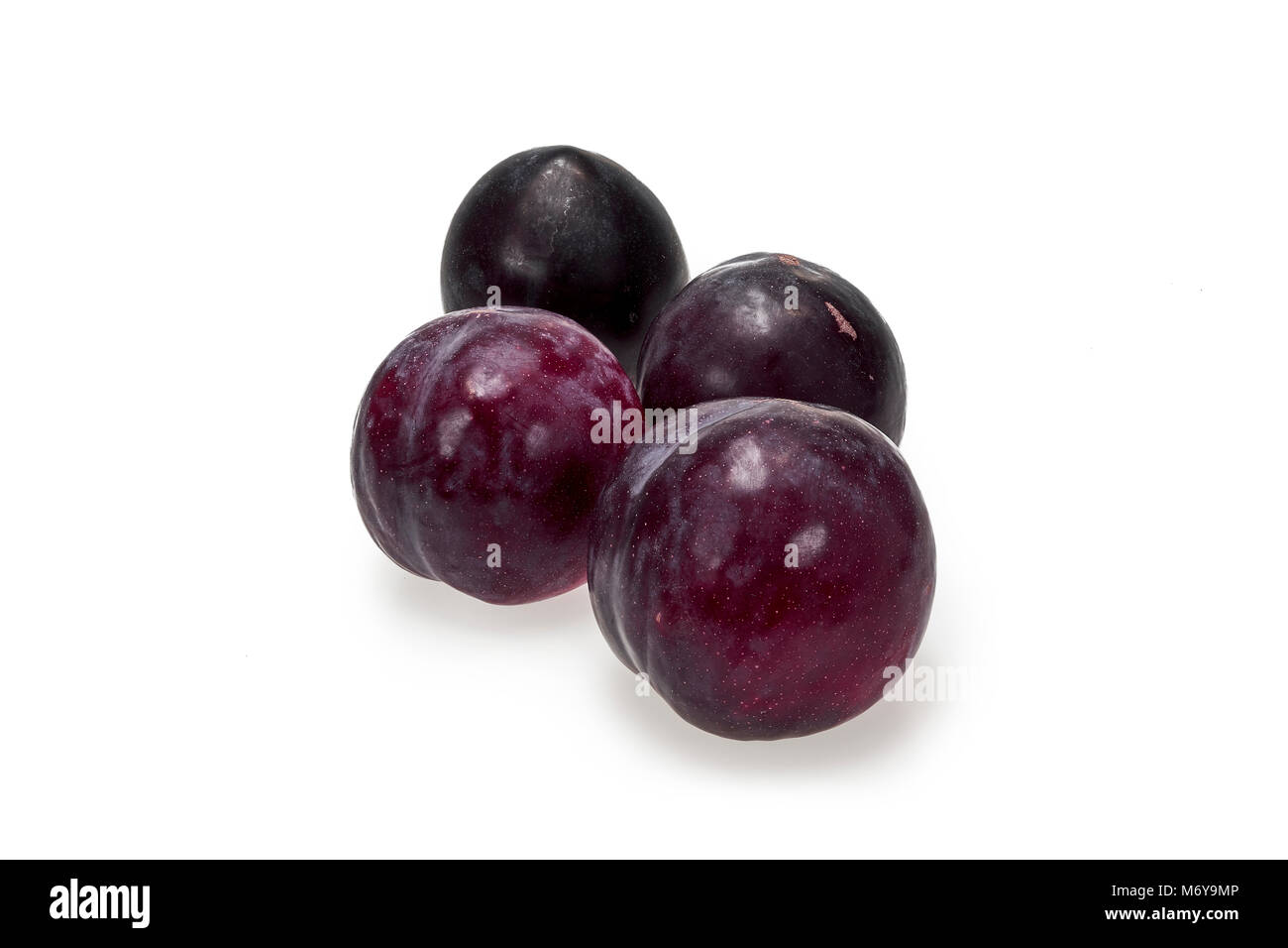 Ripe plum isolated on white background Stock Photo - Alamy