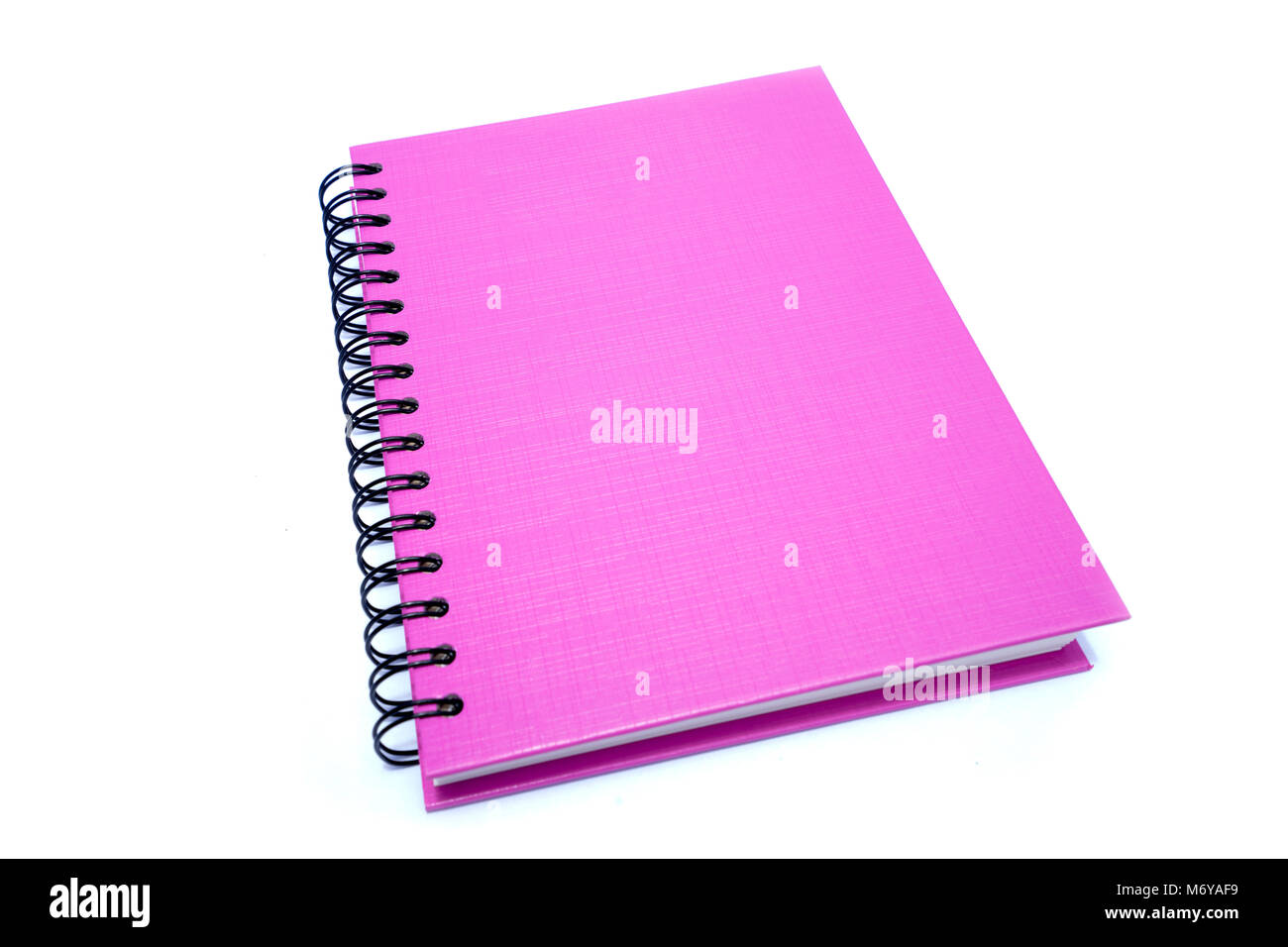 Pink note book isolated on white background Stock Photo - Alamy