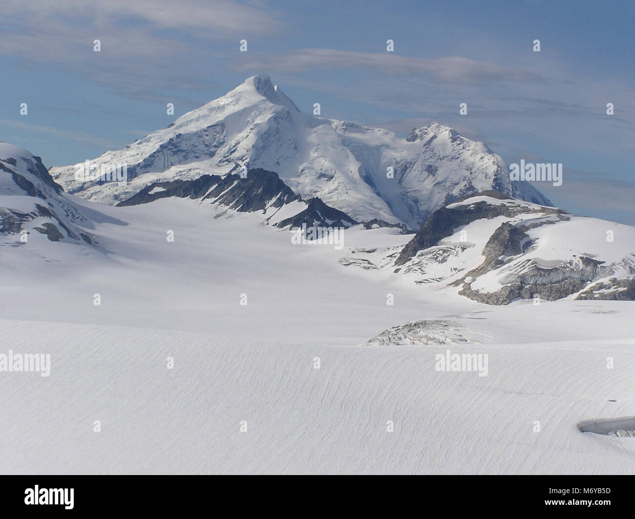 Redoubt Volcano . An aerial view looking toward snowy Redoubt Volcano ...