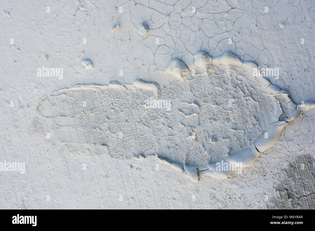 Pattens are formed on a concrete background Stock Photo - Alamy